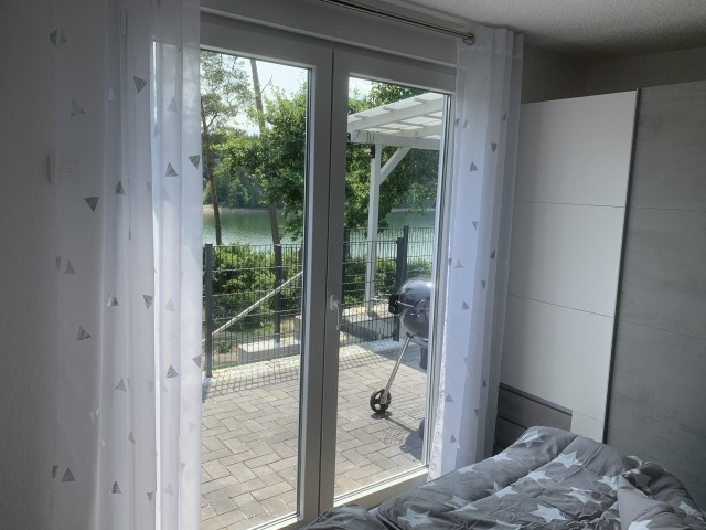 Ferienhaus mit Panoramaseeblick, komplett eingezäunt, freies WLAN