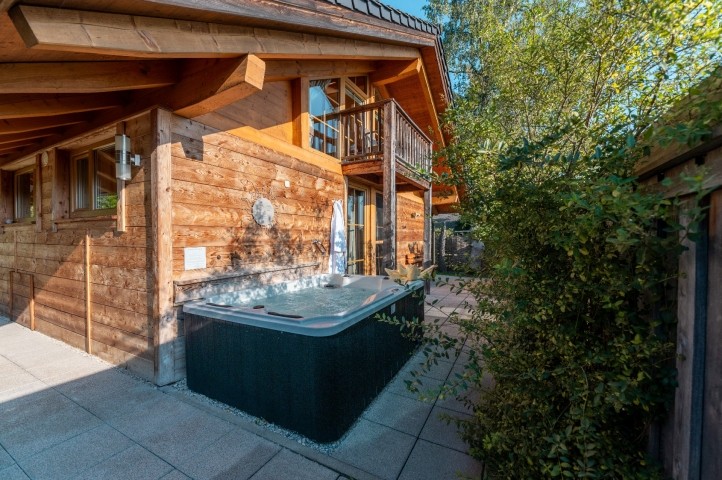 Heimat Chalet mit Whirlpool, Sauna, umzäuntem Garten